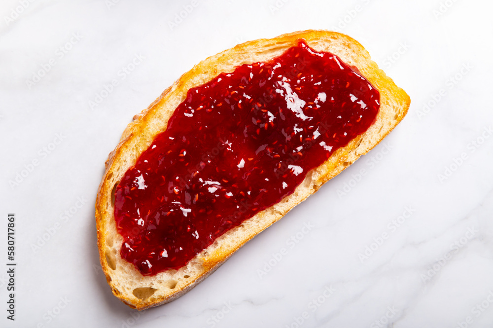 Open Sandwich with toasted sourdough white bread slices and raspberry ...