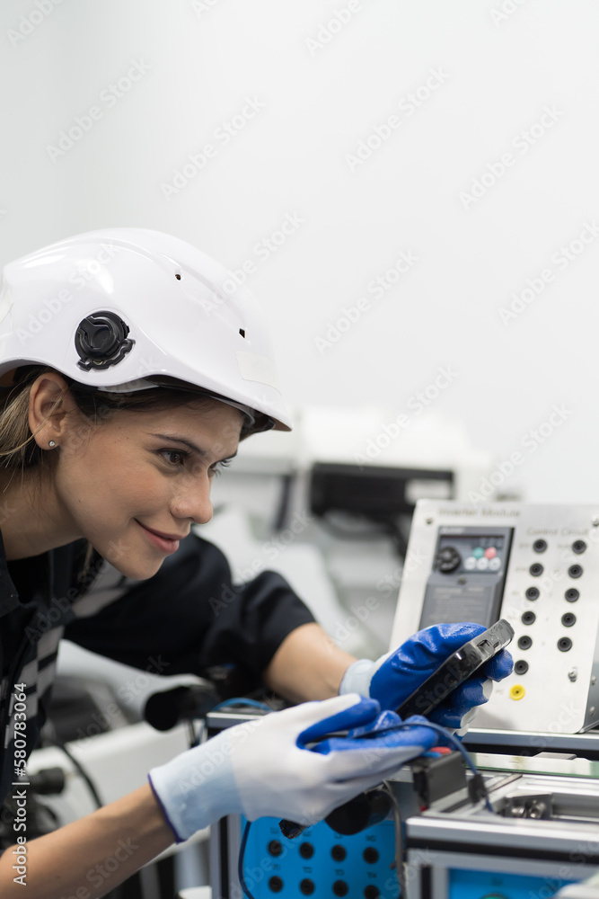 Female engineer control autonomous mobile robot or AMR in the ...