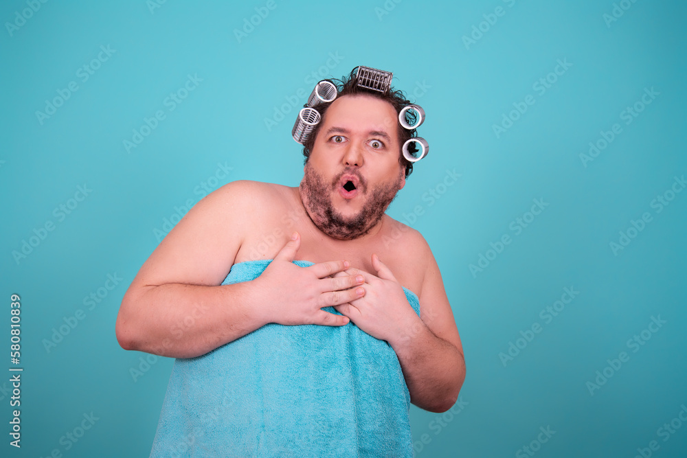 Funny fat man does his hair and washes in the shower. Stock Photo ...