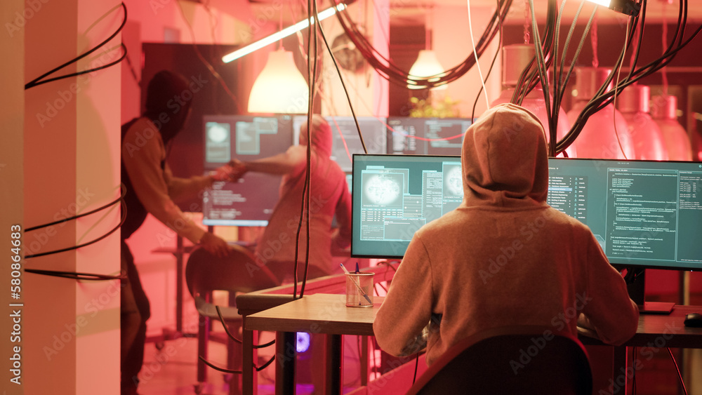 Foto Stock Law enforcement agencies stopping hackers to do cryptojacking, enforcing police ...