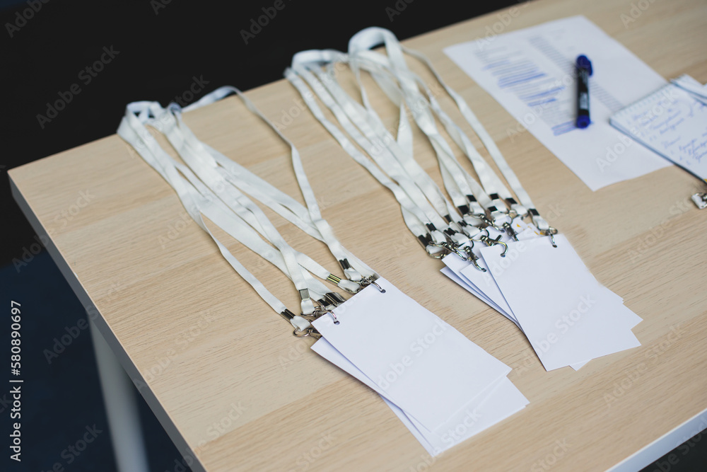 Registration desk table, process of checking in on a conference ...