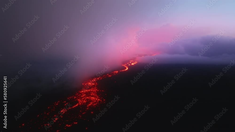 Cinematic epic aerial of pink sunset with purple clouds above lava flow ...
