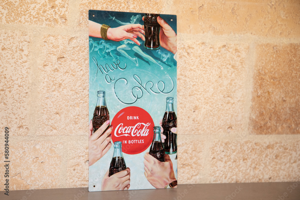 Coca Cola coke bottles advertisement sign brand and text logo coffee ...