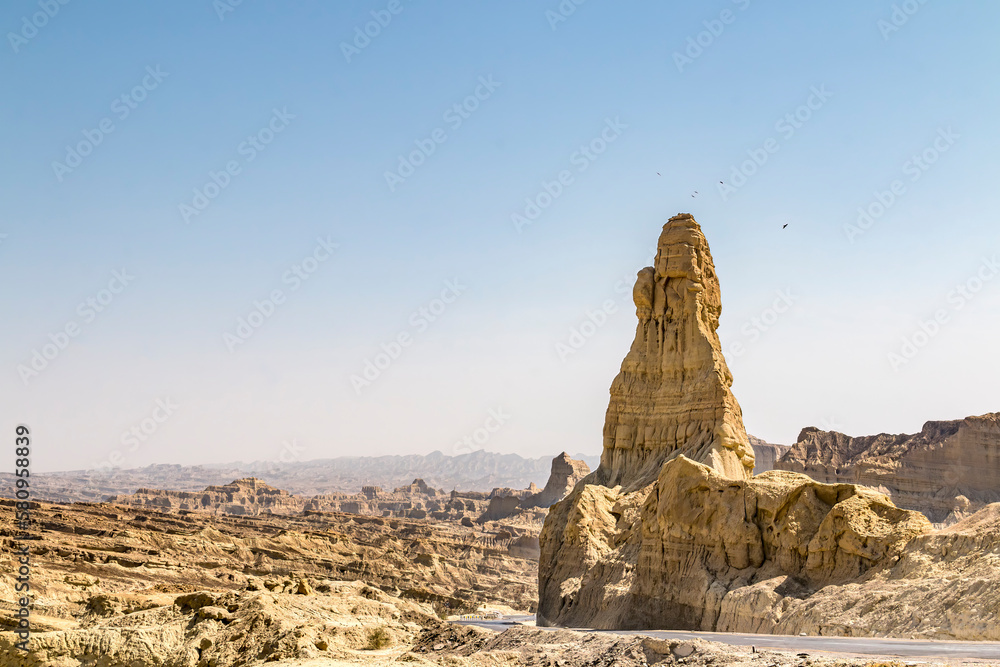 Natural rock formations and the Arabian Sea and Makran Coastal Highway ...