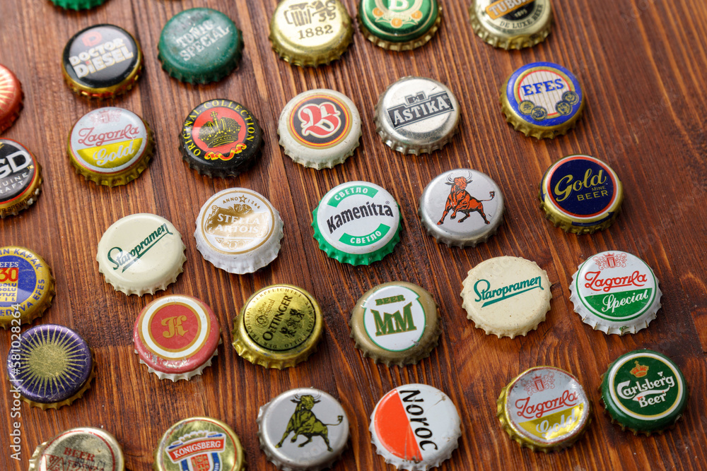 Tyumen, Russia-February 15, 2023: Set of beer caps. A mix of various ...