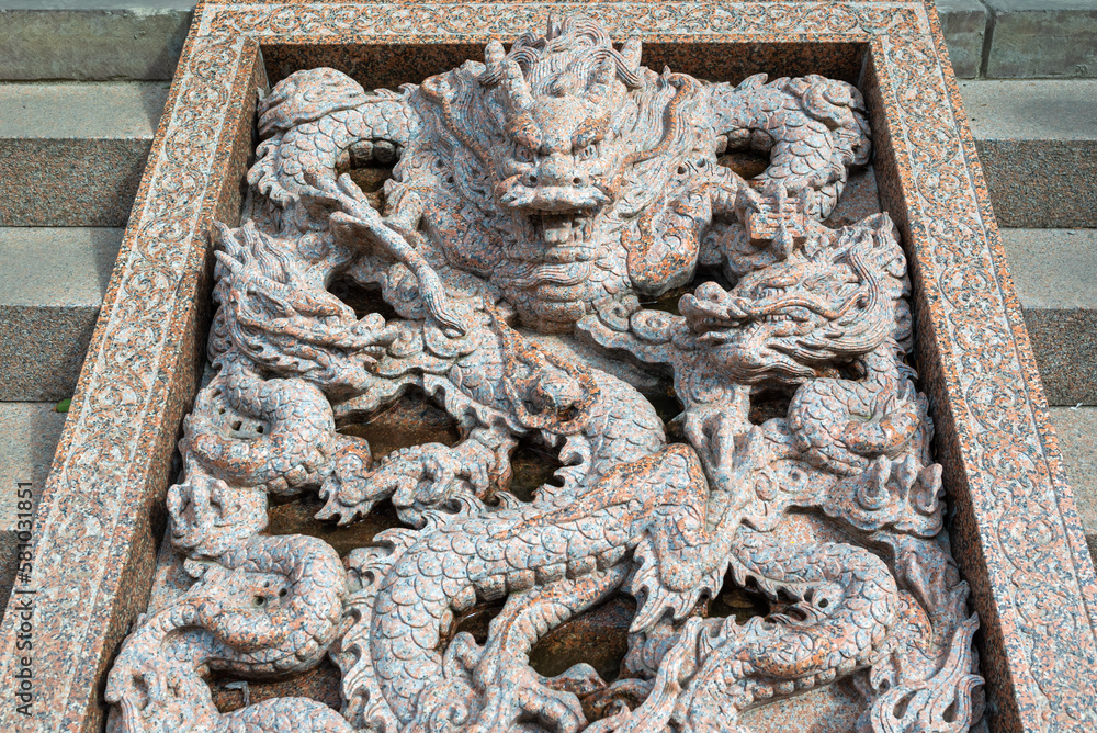 Chinese dragon bas-relief on stairs in Daci buddhist temple in downtown ...