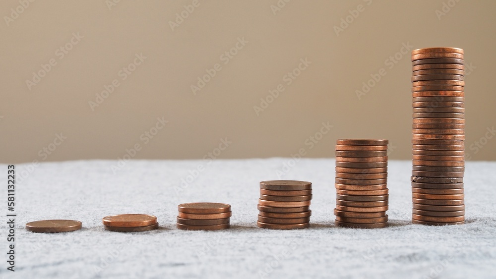 stack of one euro cents that show exponential growth, compound interest ...