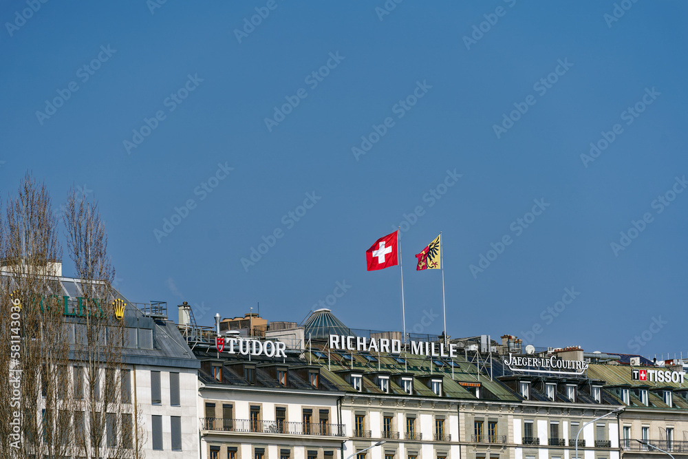 Facades of historic houses with advertising for Swiss watch brands at ...