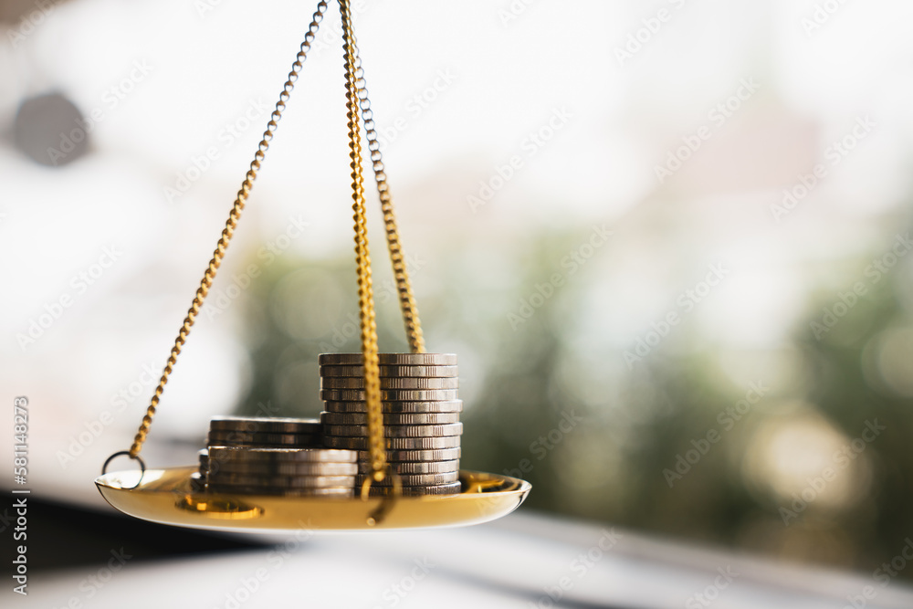 Coins stack with balance scale. Money management, financial plan, time ...