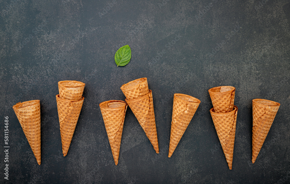 Flat lay ice cream cones collection on dark stone background . Blank ...