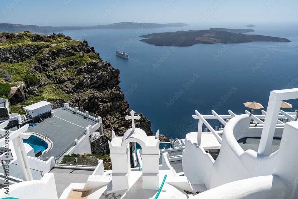 Typical white washed greek buildings in Santorini overseeing the ...