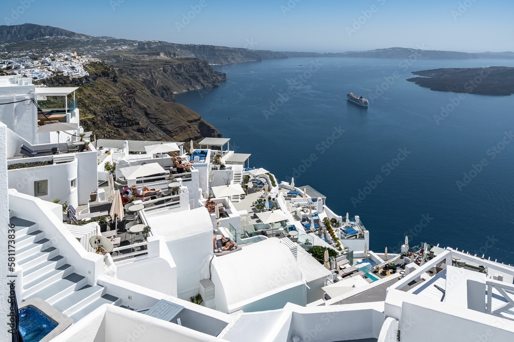 Typical white washed greek buildings in Santorini overseeing the ...