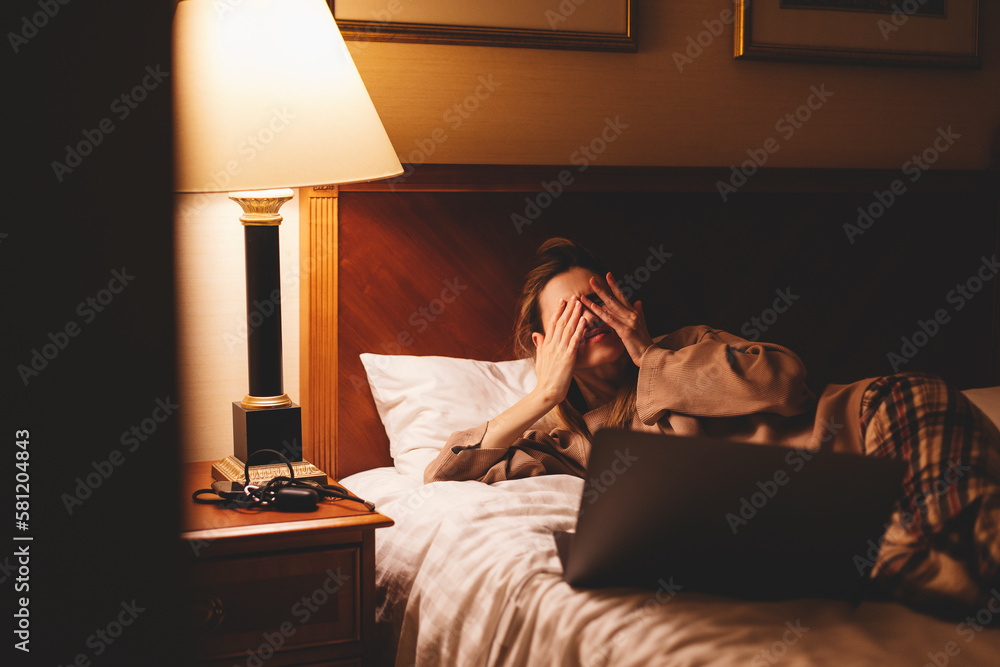 Don't want to see. Afraid young woman covering eyes with palm, feeling ...