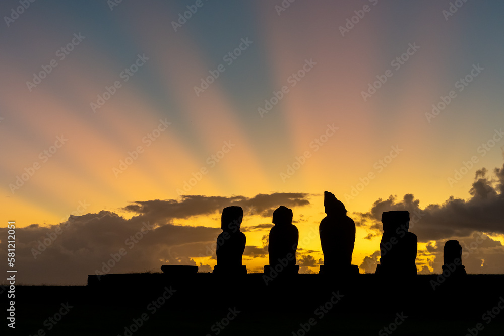 Sunset behind the moai statues on Ahu Vai Ure in Tahai complex on ...