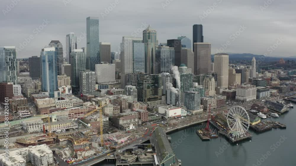Aerial skyline view of downtown Seattle with piers of The Great Wheel ...