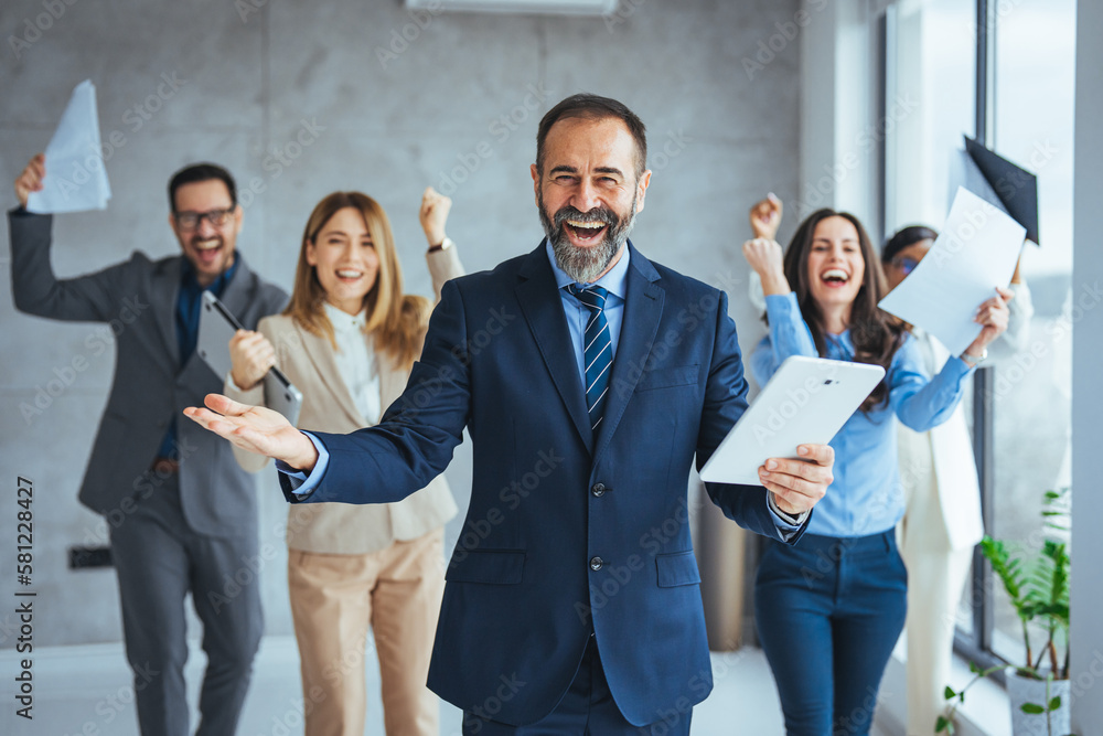Business team celebrating a triumph with arms up. Celebrate to business ...