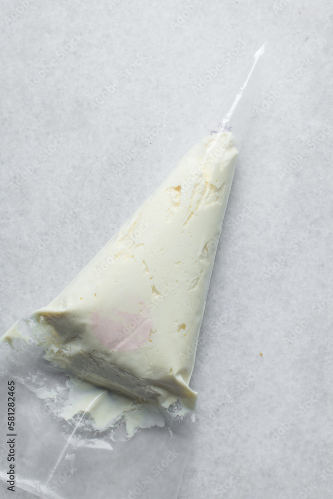 Buttercream in a piping bag, American buttercream in a piping bag for ...