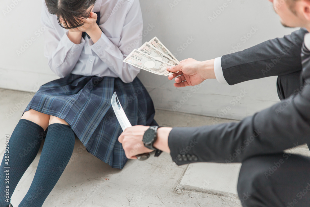 お金と引き換えに売春・パパ活・援助交際を迫る男性と女子高生・高校生・中学生 스톡 사진 Adobe Stock