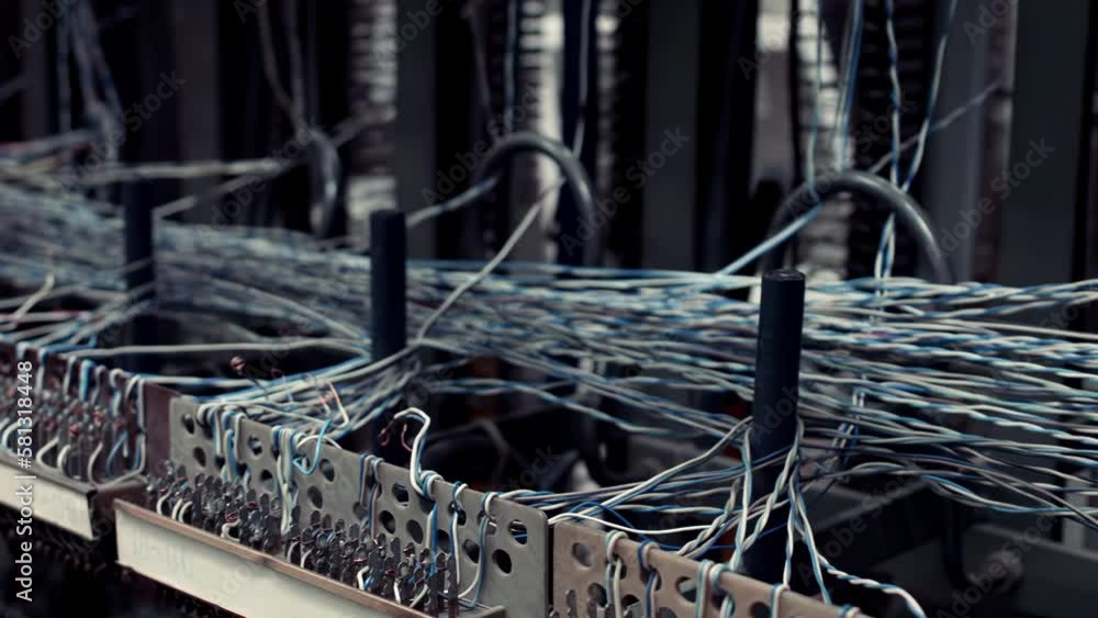 Vintage telephone exchange station, featuring connection wires and a ...