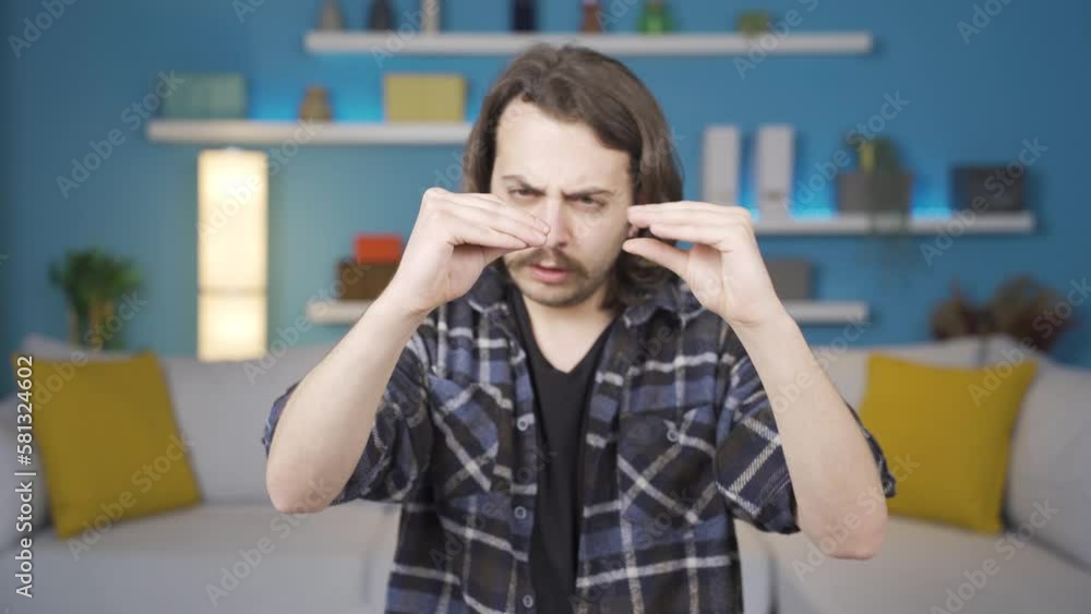 The man with his hands talking. It represents angry people. The man is ...