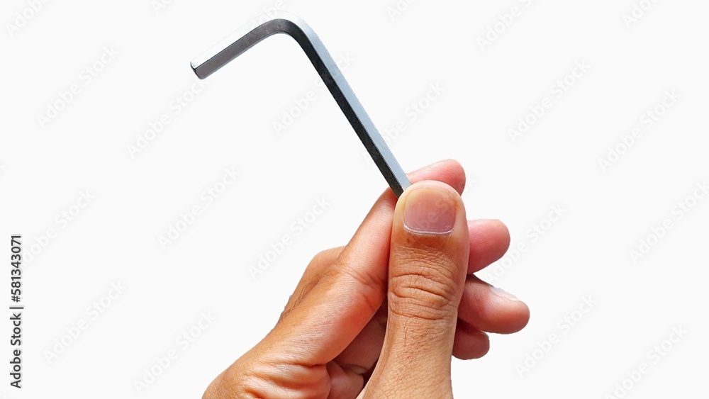 Hand holding allen key or allen wrench on white background Stock Photo ...