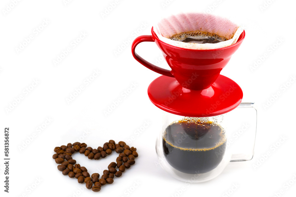 dripping coffee in red drip cup and the coffee water flows into the ...