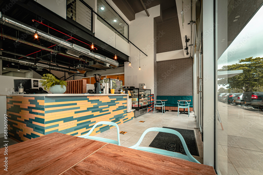 Modern co working office building complex with integrated coffee shop ...