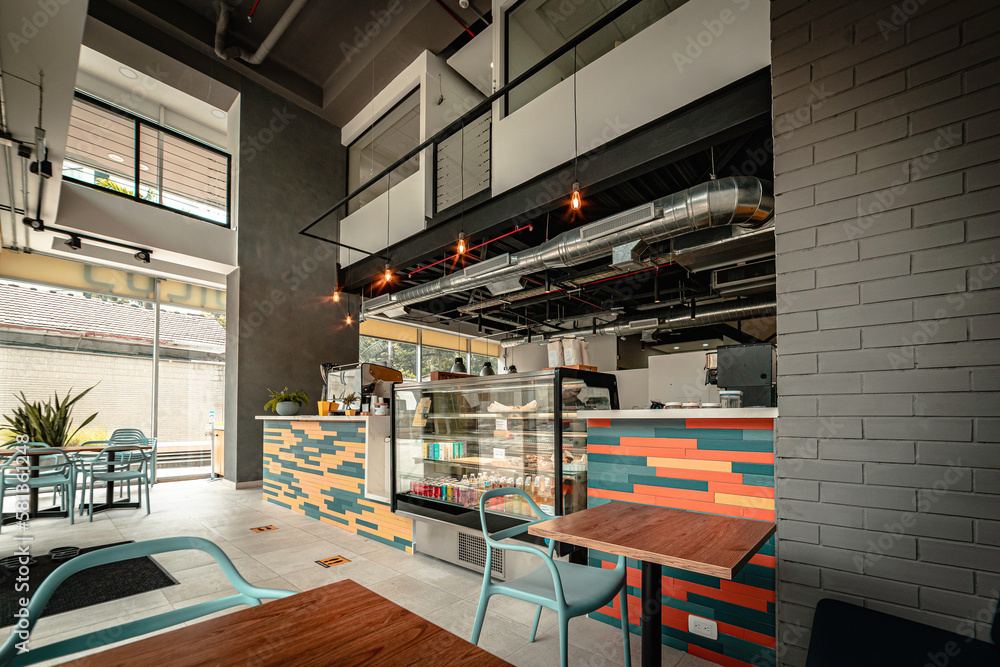 Modern co working office building complex with integrated coffee shop ...