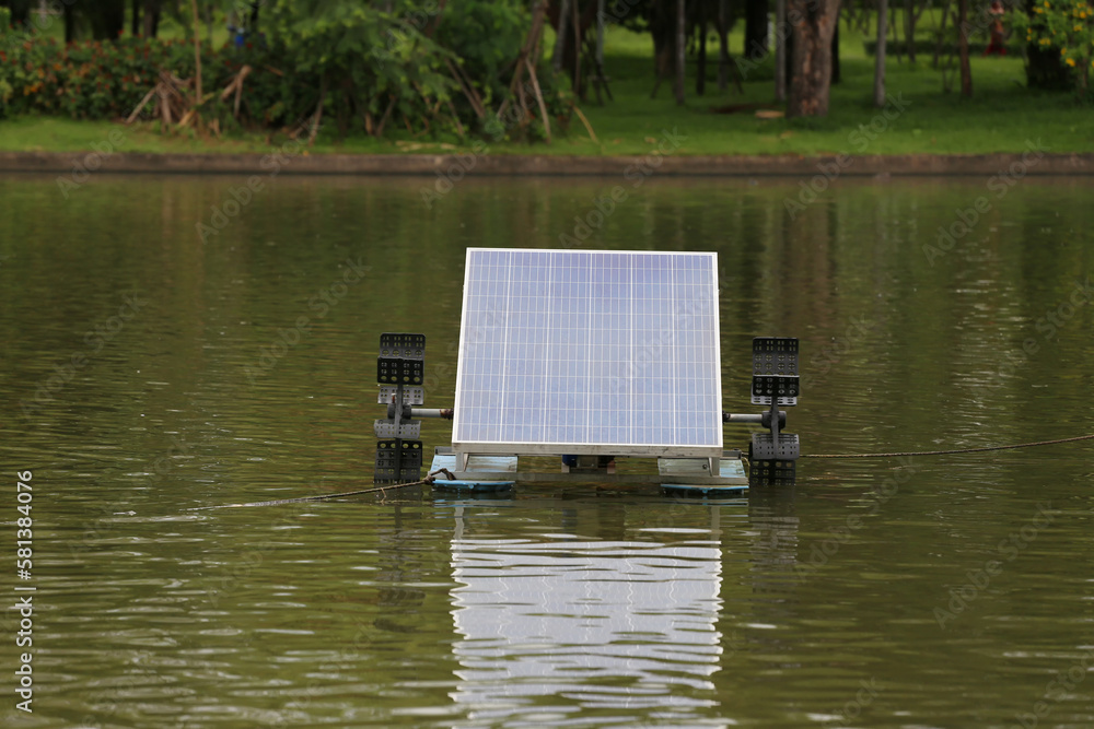 Water turbine powered by solar energy in the pond. Stock Photo | Adobe ...