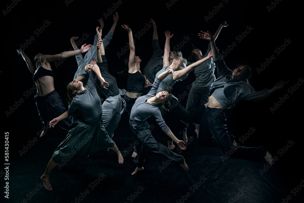 Top view. Expressive contemp dance. Group of young people dancing ...