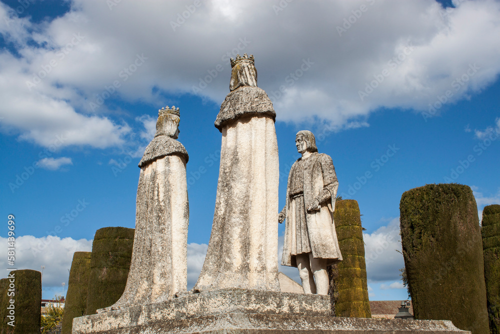 Ancient stone statue of Christopher Columbus and the Catholic Monarchs ...