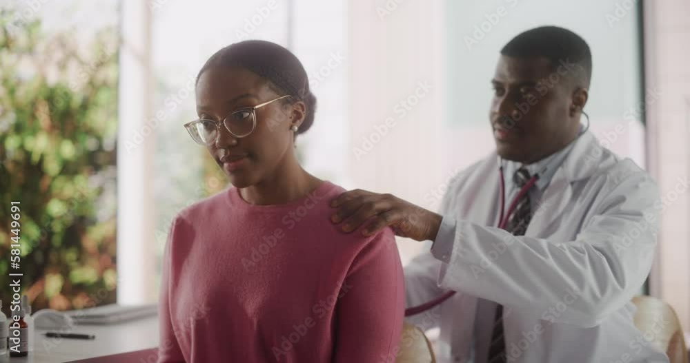 Beautiful Black Female Passing a Health Examination by a Professional ...