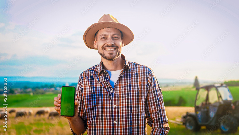Portrait of handsome young man farmer in hat smiling to camera and ...