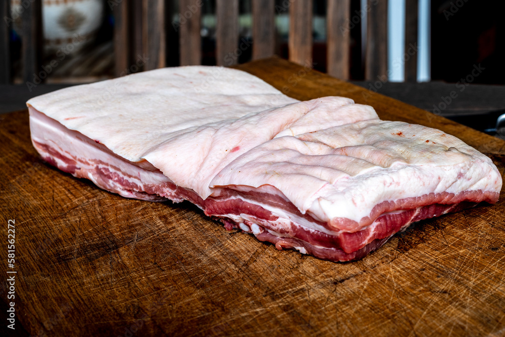 Meat preparation for BBQ.Pork belly is a boneless and fatty cut of meat ...