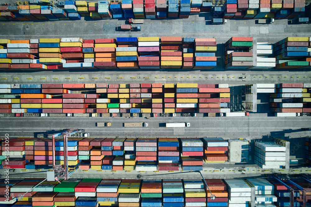Stacked cargo containers top down aerial view. Containers at logistics ...