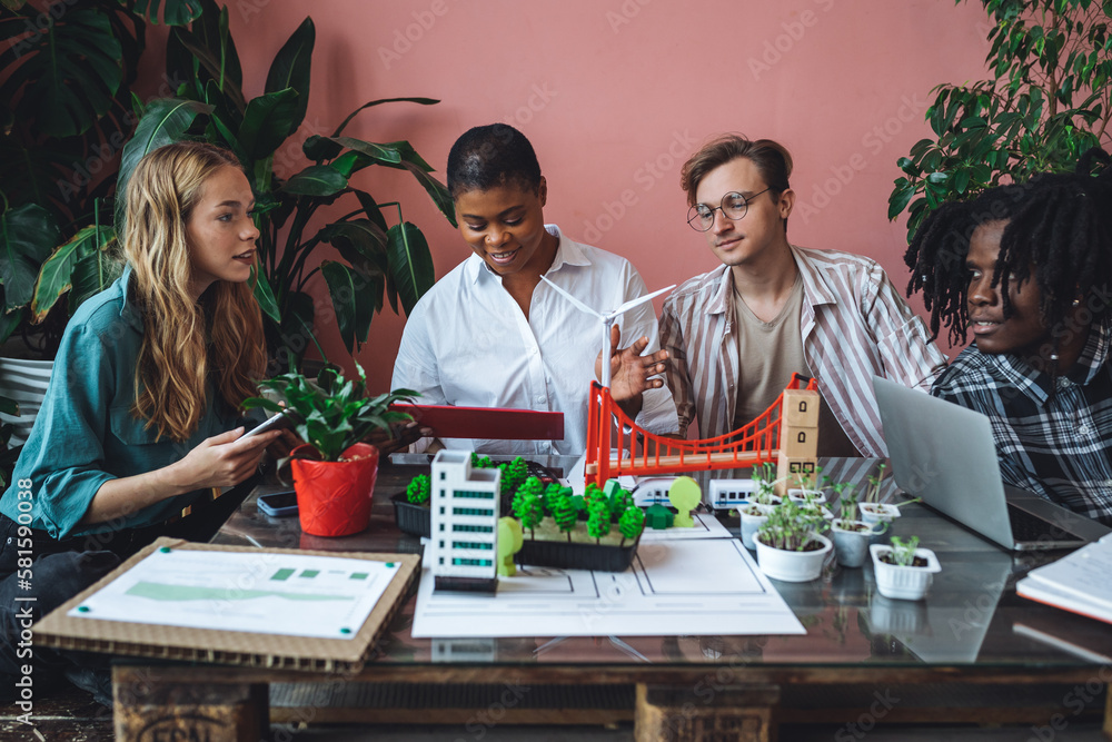 International diverse group of students working on modern urban ...