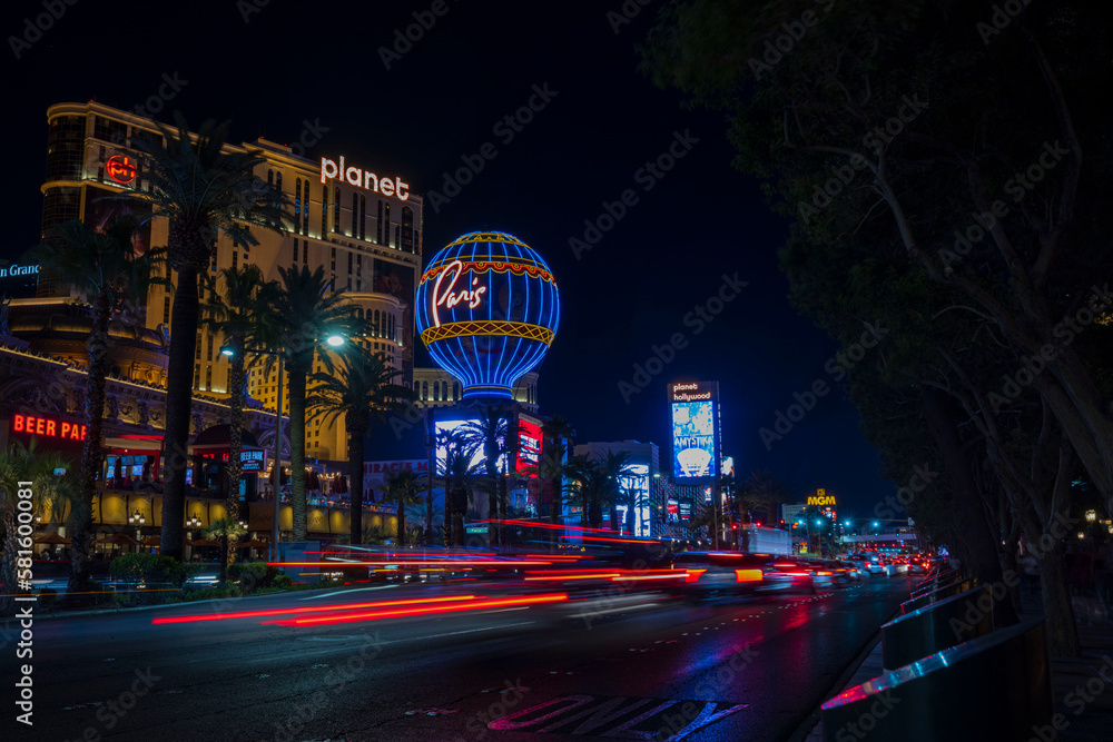 Beautiful out-of-focus strip road tracers. Night view of Las Vegas cityscape with gorgeous ...