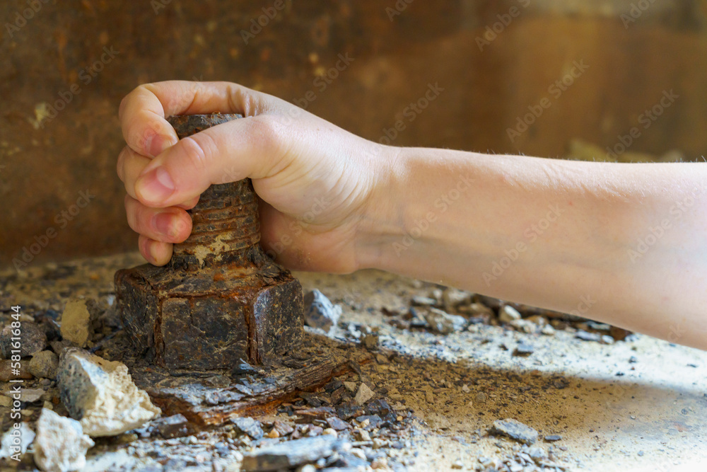Demonstration of the size of the bolts on the example of a hand ...
