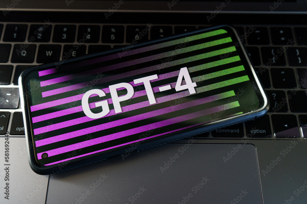 GPT - 4 on screens. OpenAI released new version of GPT 4. ChatGPT AI ...