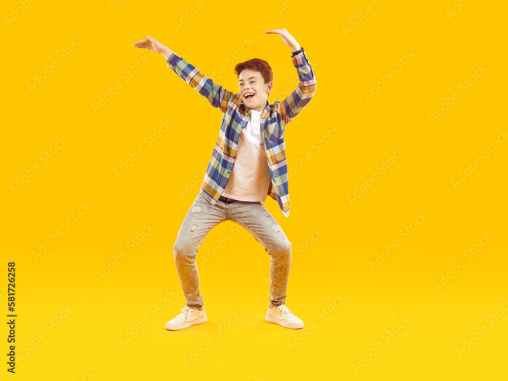 Happy dancing child. Full body shot of a funny kid dancing against a ...
