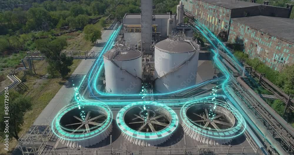 A futuristic shot of a factory exterior. Industrial cooling towers with ...