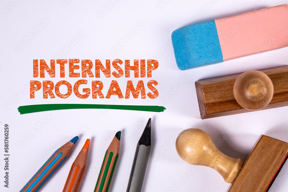 Internship Programs. Colored pencils, stamps and eraser on a white ...