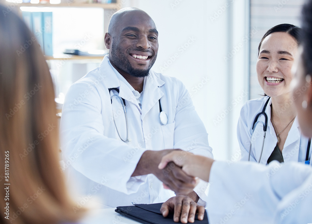 Doctors, handshake and healthcare meeting in agreement, teamwork ...