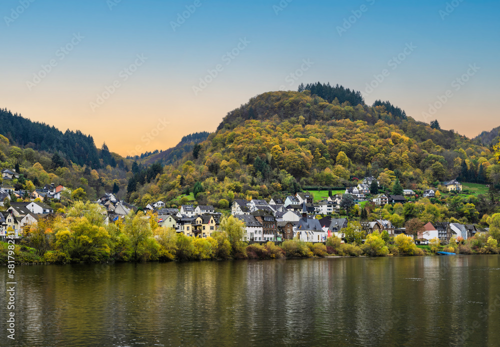 Sehl village in foothill of the mountain with colourful trees during ...