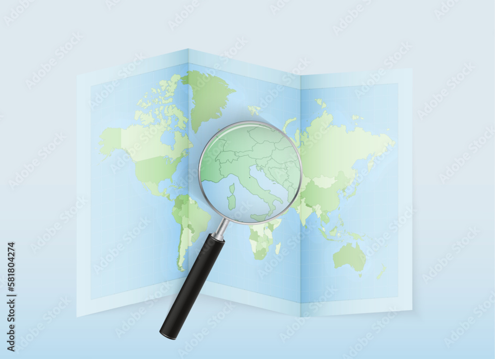 A folded world map with a magnifying lens pointing towards San Marino. Map and flag of Italy in ...