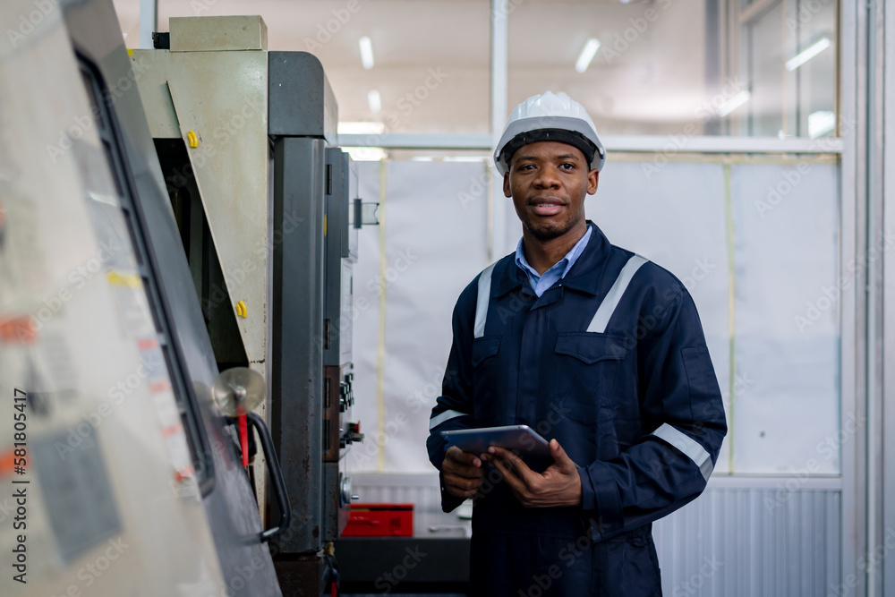 Engineer technician under control digital factory production technology ...