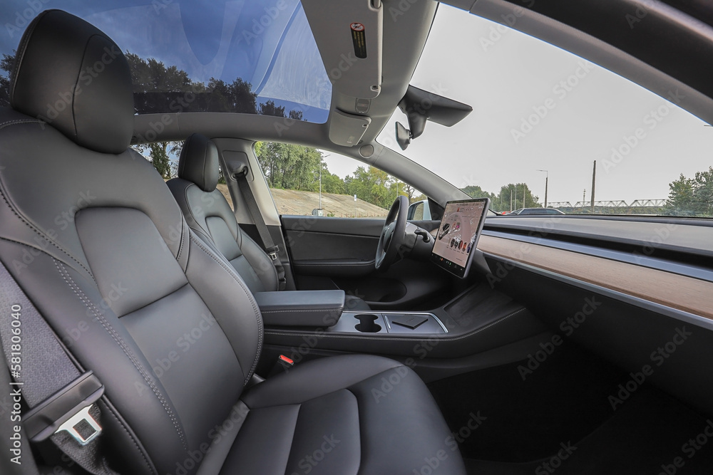 Driver's seat of the interior car Tesla Model Y Stock Photo | Adobe Stock
