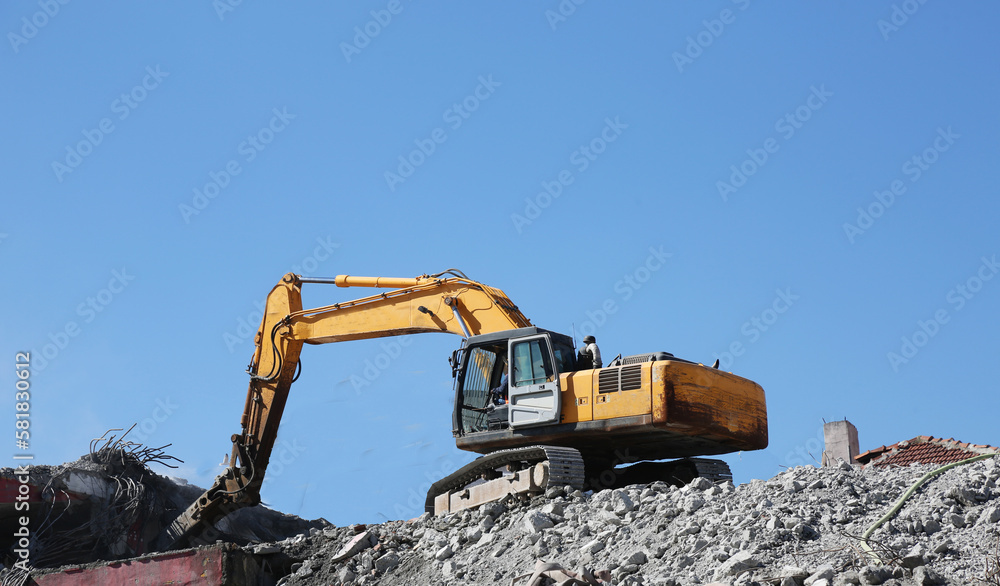 Hydraulic breaker hammer excavator at demolition work. Excavator ...