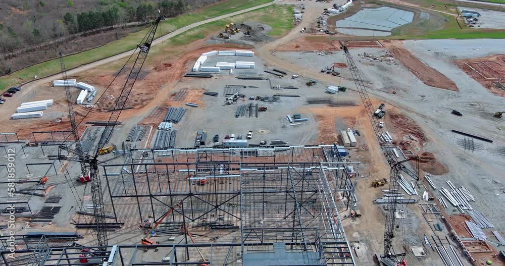 During construction industrial buildings, crawler cranes are used for ...