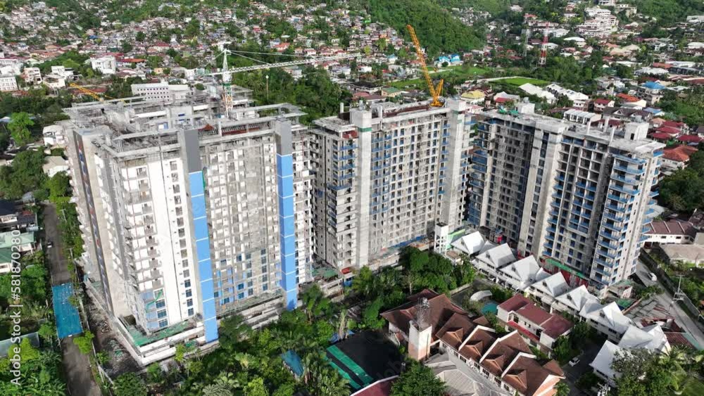 Aerial shot of the poor neighborhoods mixed in with new modern high ...